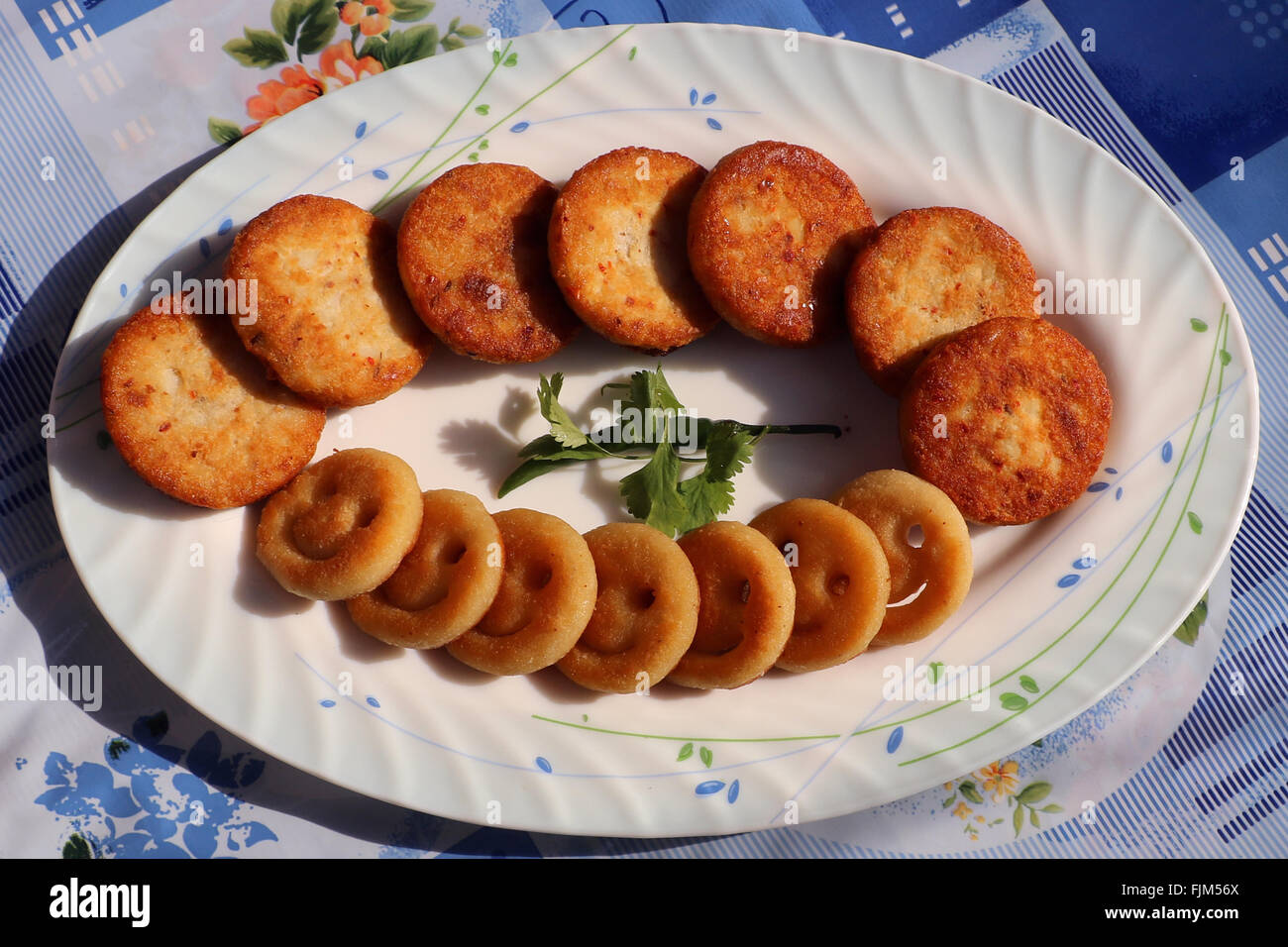 Aloo Tikki or Fried Potato Patties; a popular Indian snack served with ...