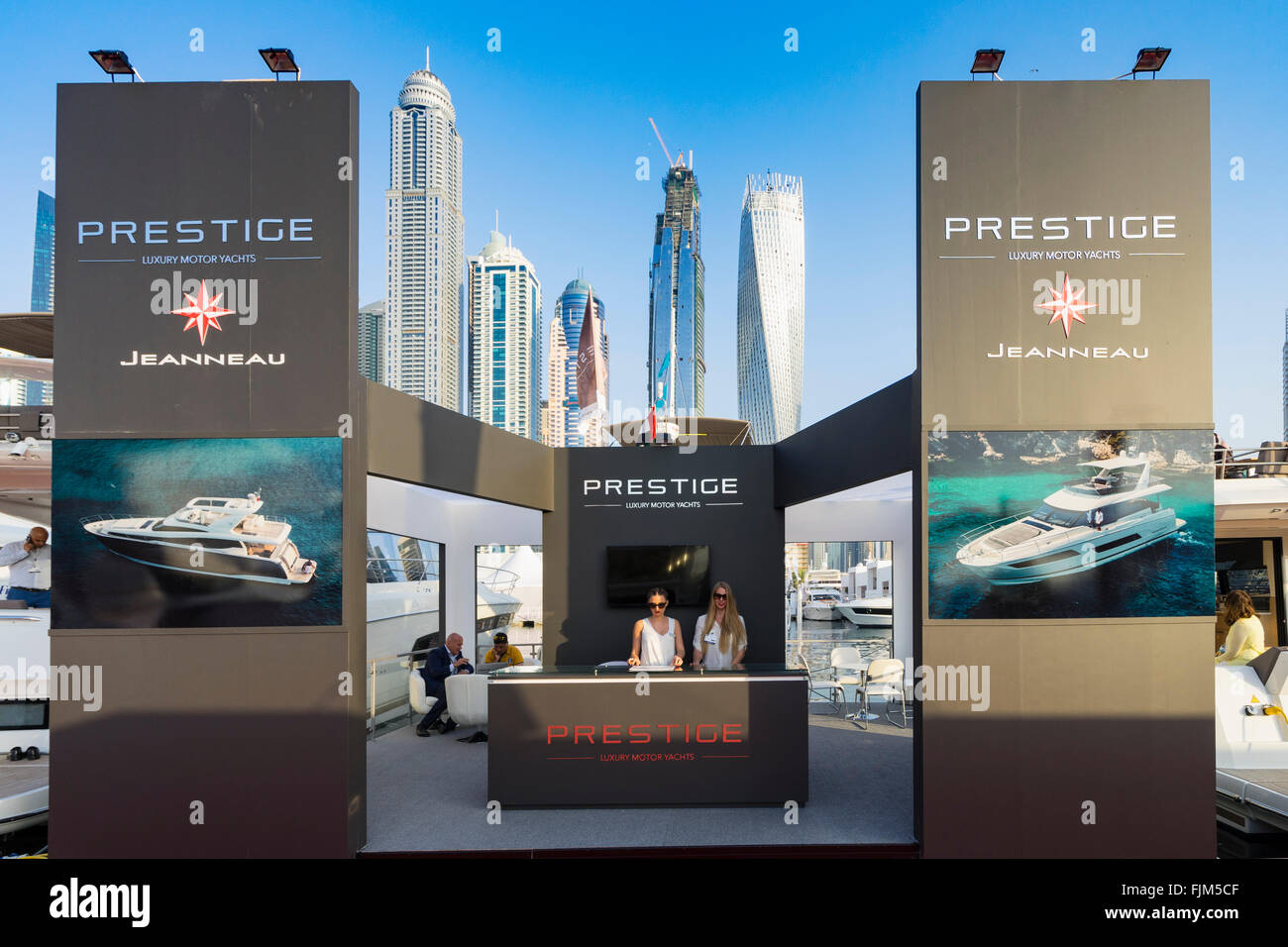 Luxury motor yacht display stand on the opening day of the Dubai ...