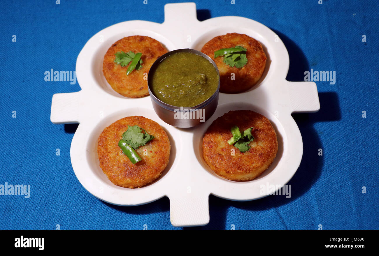 Aloo Tikki or Fried Potato Patties; a popular Indian snack served with ...