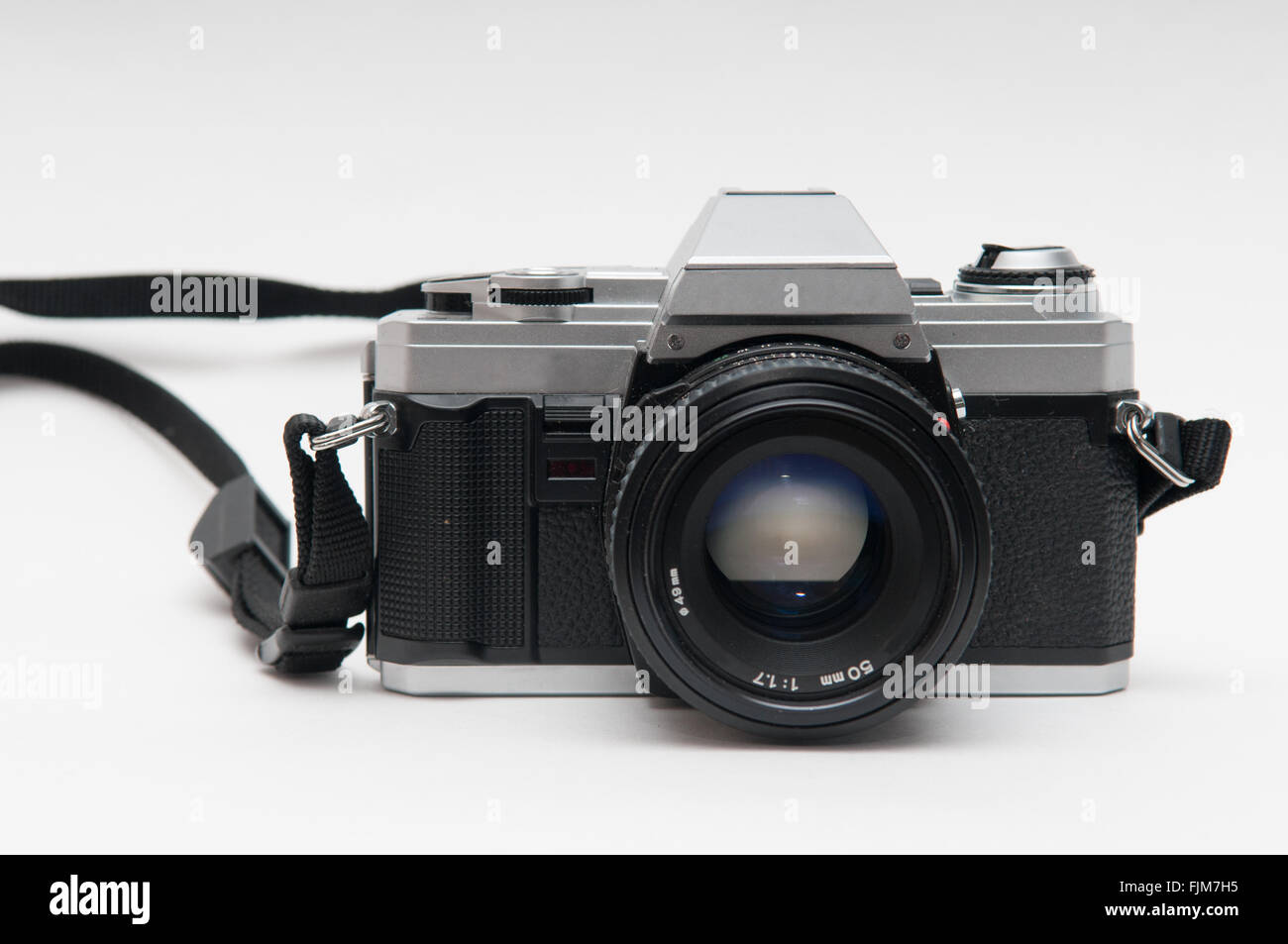 old vintage style film camera on a white background Stock Photo - Alamy