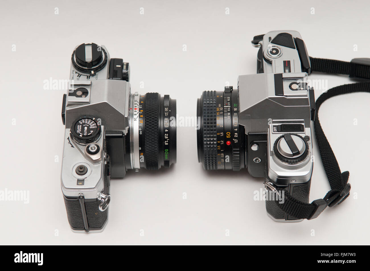 old vintage style film camera on a white background Stock Photo - Alamy