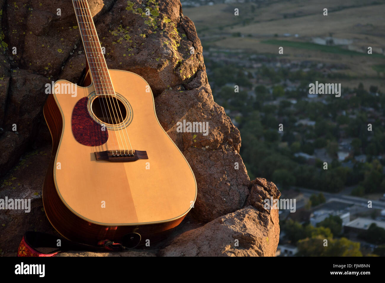 Bright Acoustic Guitar in the Mountains Stock Photo - Alamy
