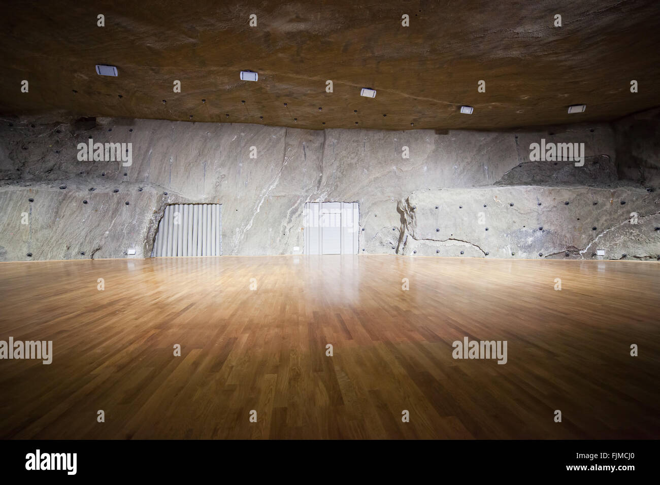 Europe, Poland, large, empty, chamber with wooden floor in Wieliczka ...