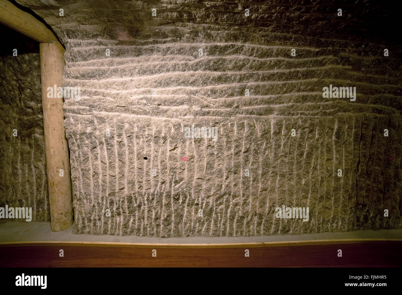 Underground rock of salt wall with visible traces from mining in old ...