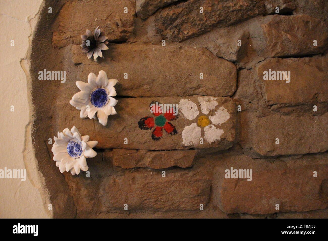 Brick flower wall Stock Photo - Alamy
