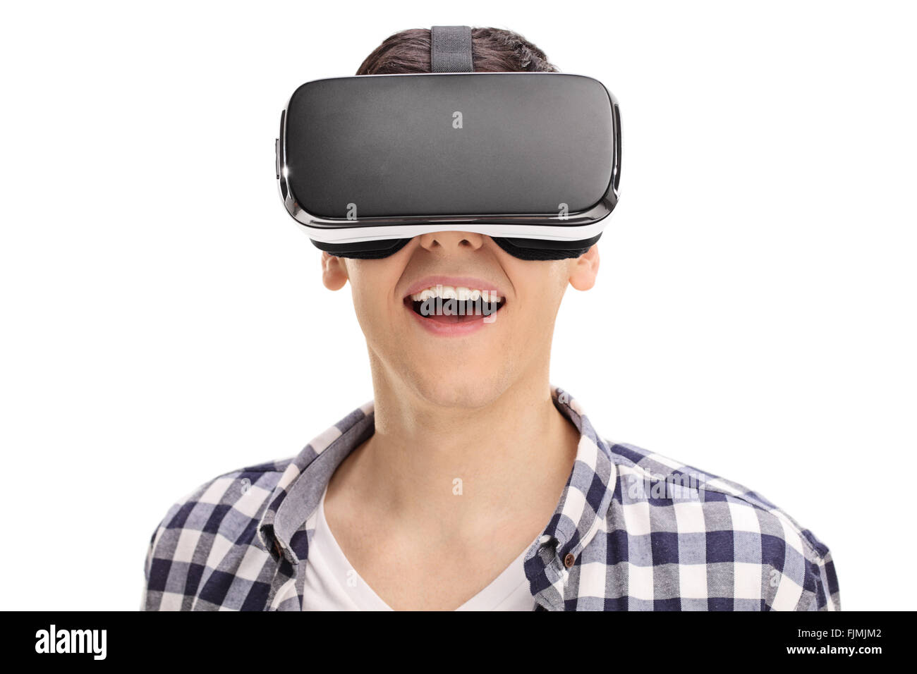 Joyful man using a VR headset and experiencing virtual reality isolated ...