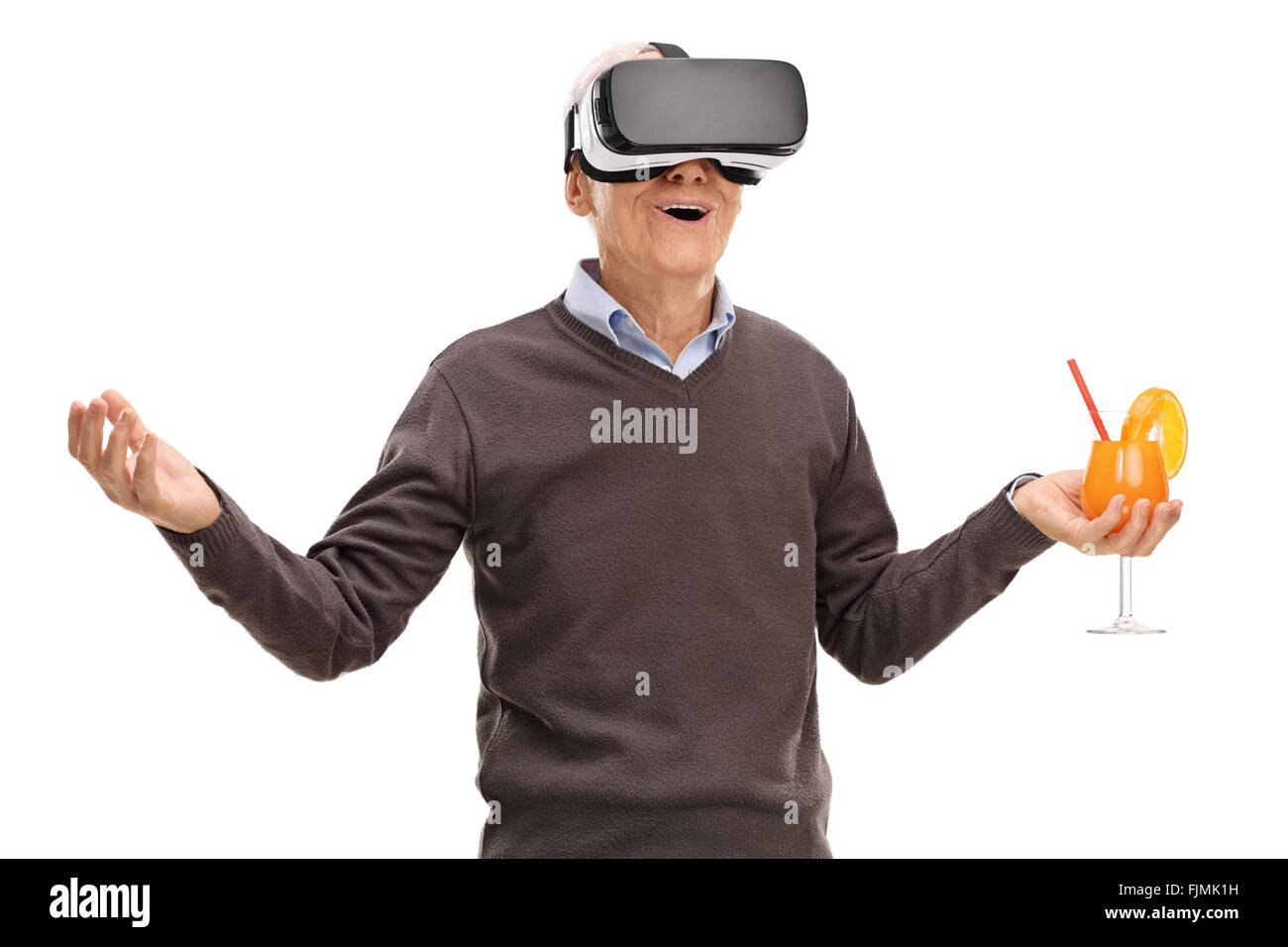 Senior using a VR headset and holding an orange cocktail isolated on ...