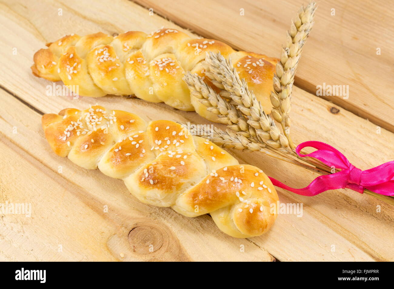 Homemade braid pastry with wheat plant and a ribbon Stock Photo - Alamy