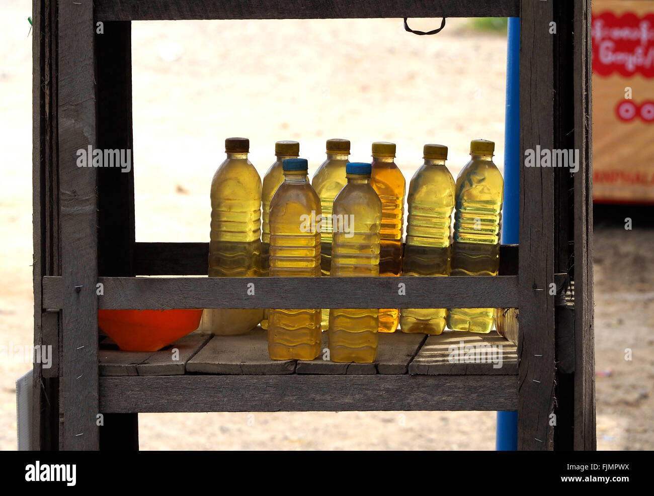 Loose bottles of petrol for sale at the roadside, Myanmar Stock Photo ...