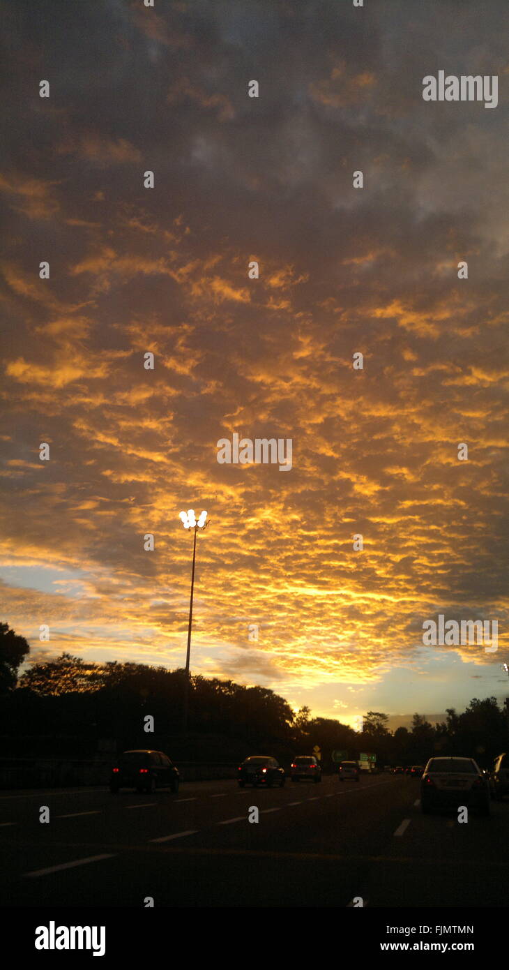 Cars On Highway Against Sunset Sky Stock Photo - Alamy