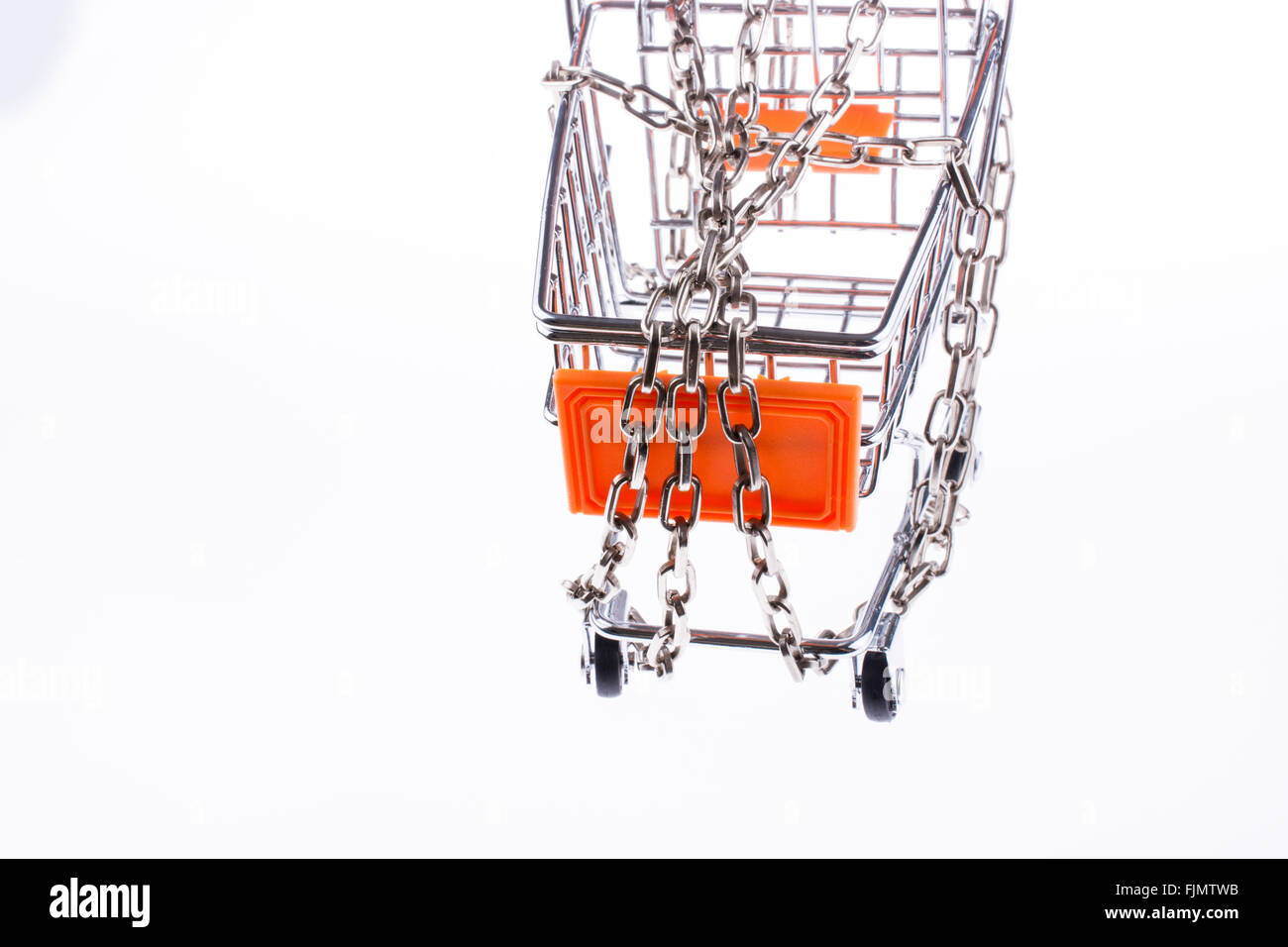 Chained shopping cart in white background Stock Photo - Alamy