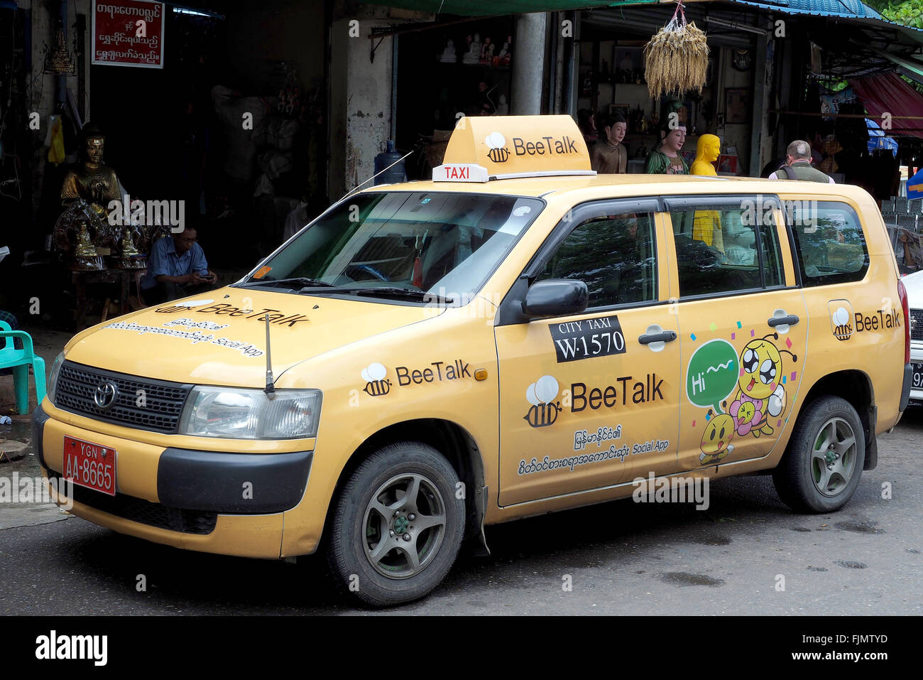 "Bee Talk" taxi in Yangon, Myanmar Stock Photo - Alamy
