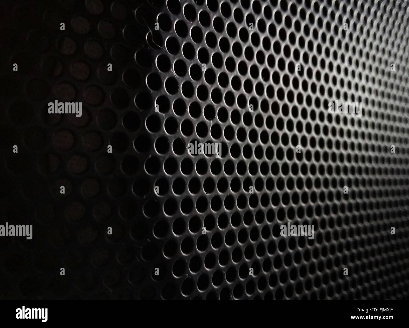 Perforated metal backgrounds hi-res stock photography and images - Alamy