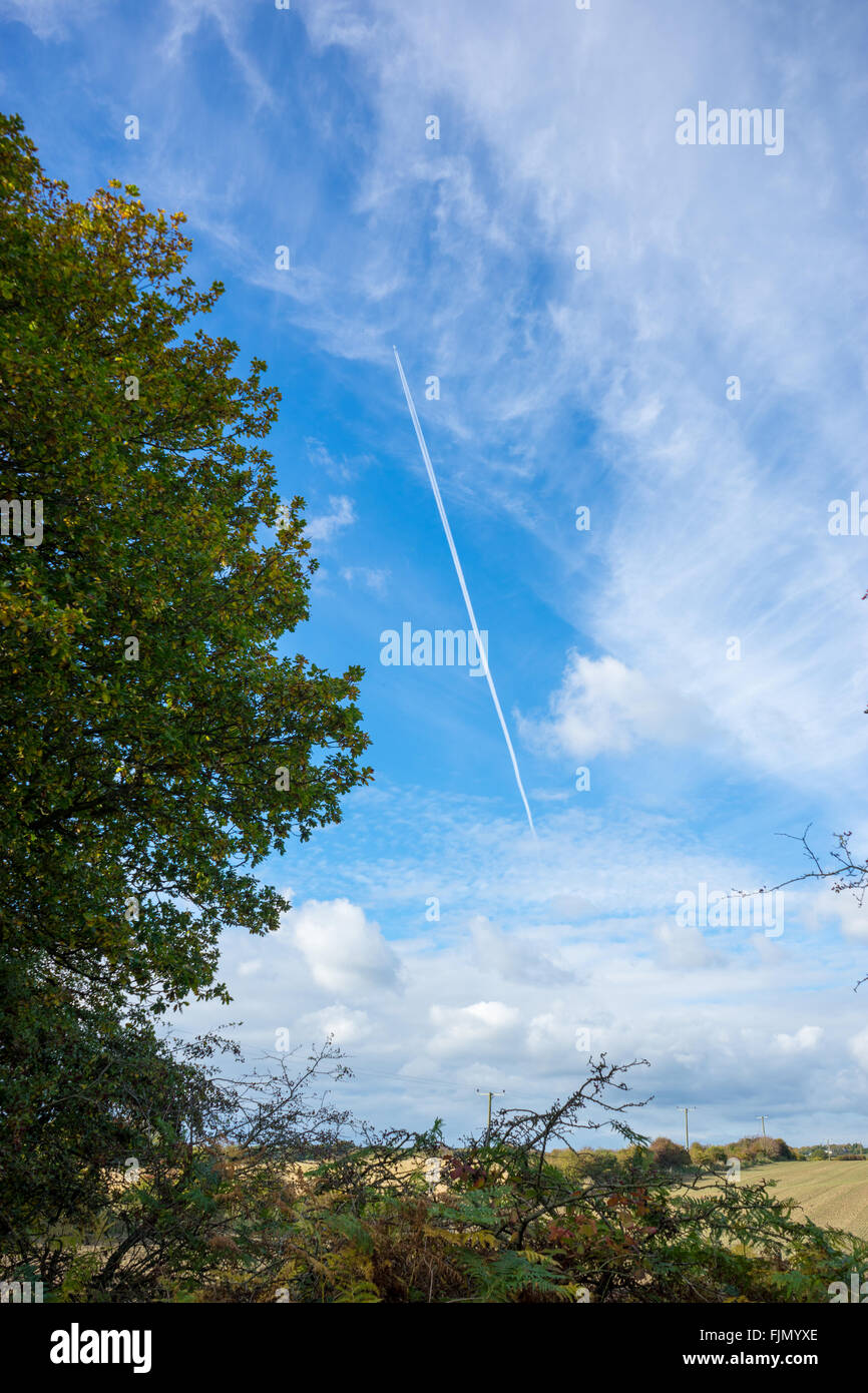 Plane vapor trail Stock Photo - Alamy