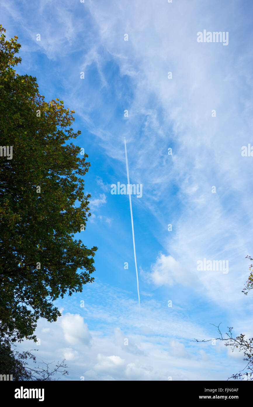 Plane vapor trail Stock Photo - Alamy