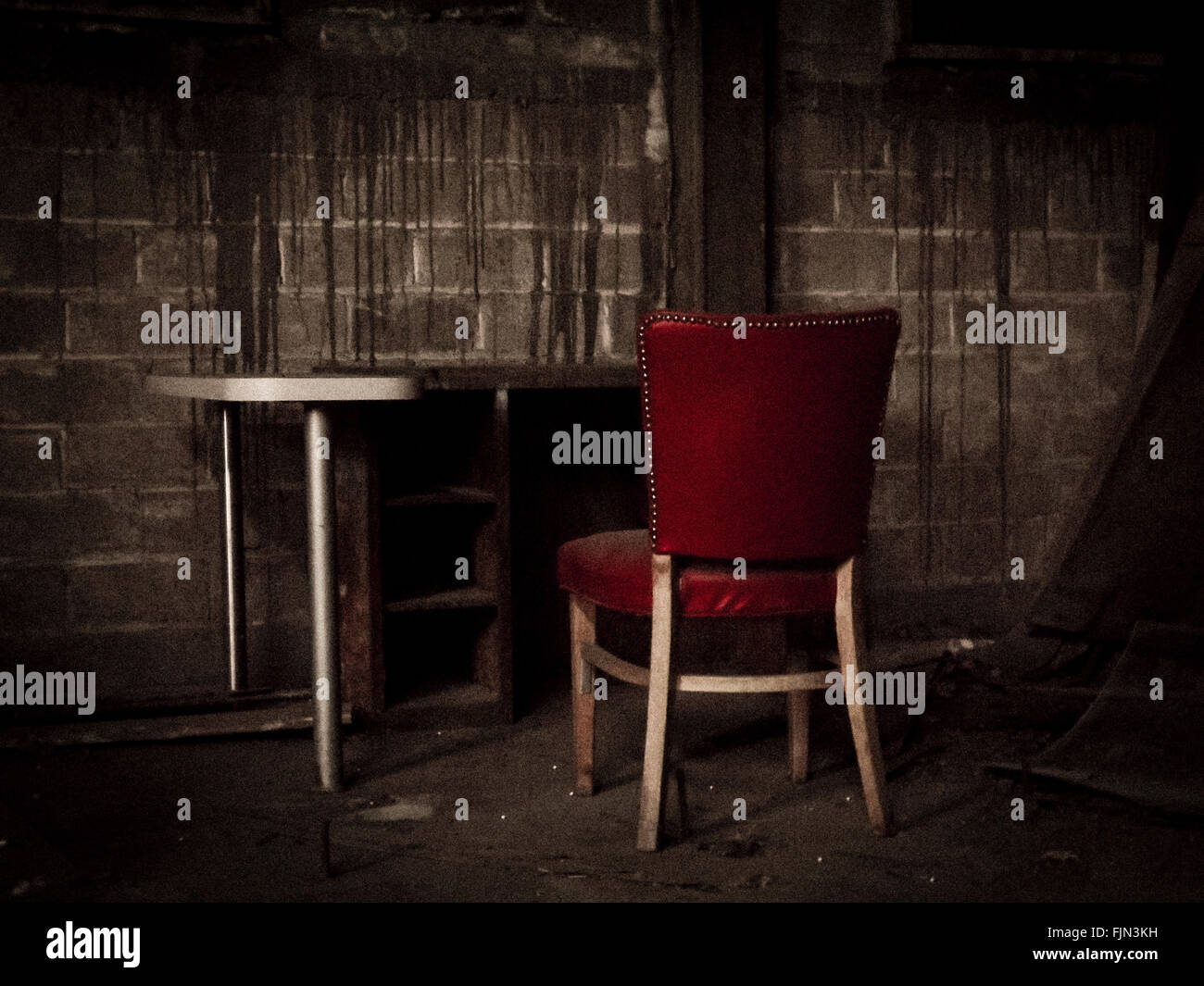 Empty Chair And Table In Abandoned House Stock Photo - Alamy