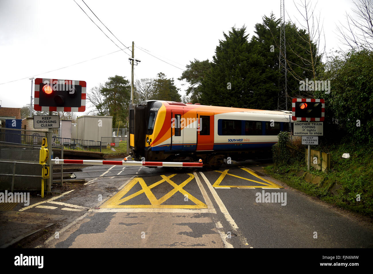 Level crossing gates railway hi-res stock photography and images - Alamy