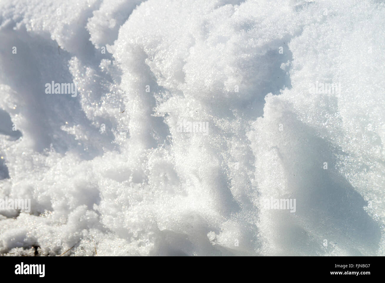 Natural snow background from frozen crystal and snowflake Stock Photo ...