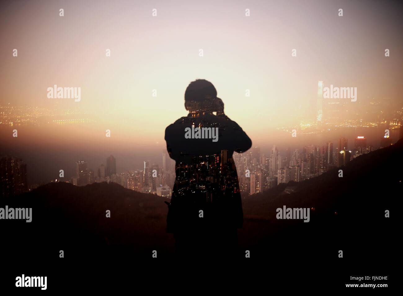 Person overlooking cityscape hi-res stock photography and images - Alamy