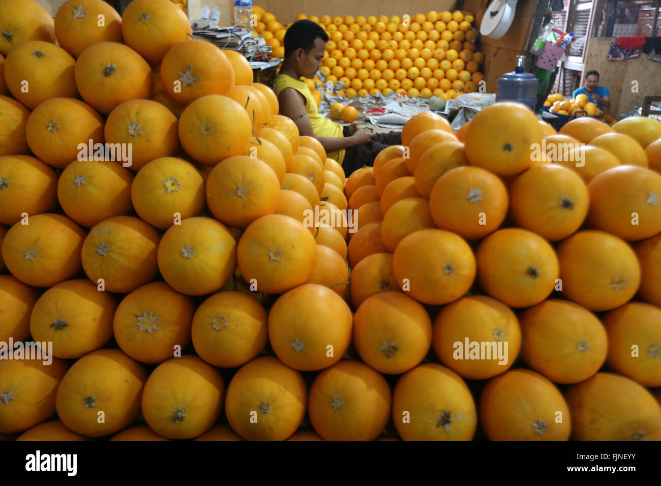 Yangon, Myanmar. 3rd Mar, 2016. A man waits for customers at the Thiri ...