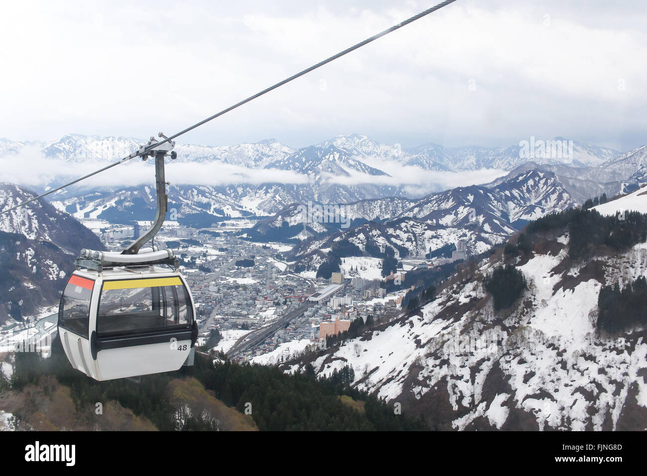 Cable car on the top of mountain with snow in winter Stock Photo - Alamy