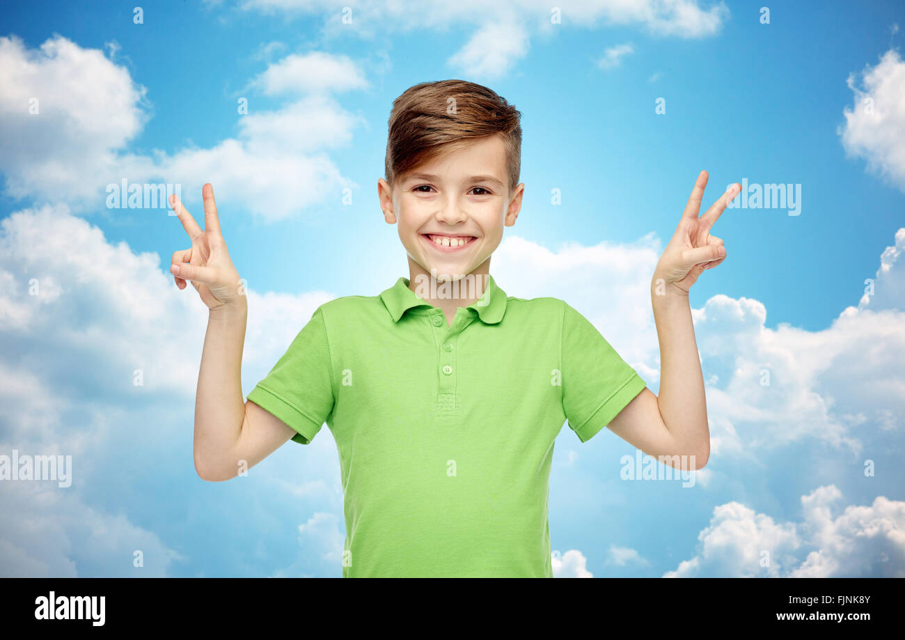happy boy showing peace or victory hand sign Stock Photo - Alamy