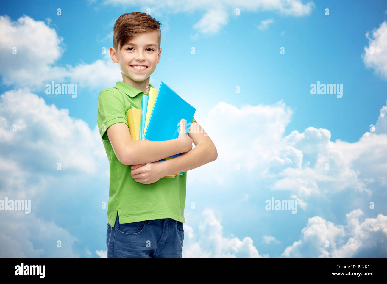 happy student boy with folders and notebooks Stock Photo - Alamy