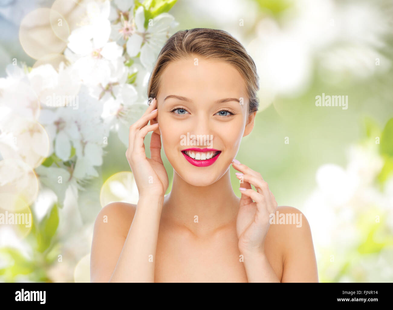 smiling young woman with pink lipstick on lips Stock Photo - Alamy