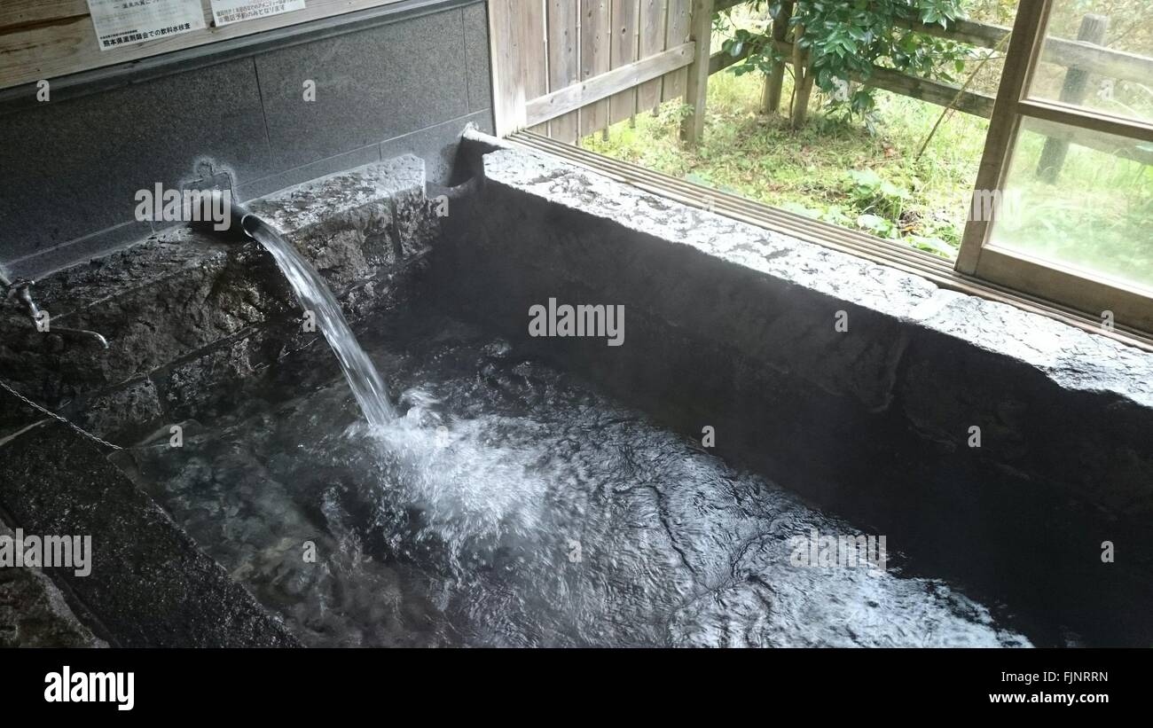 Water falling from pipe to trough day hi-res stock photography and ...