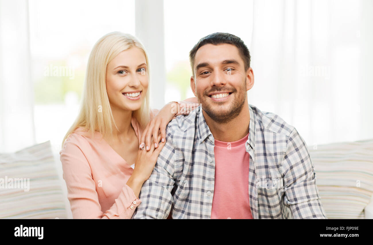 smiling happy couple at home Stock Photo - Alamy