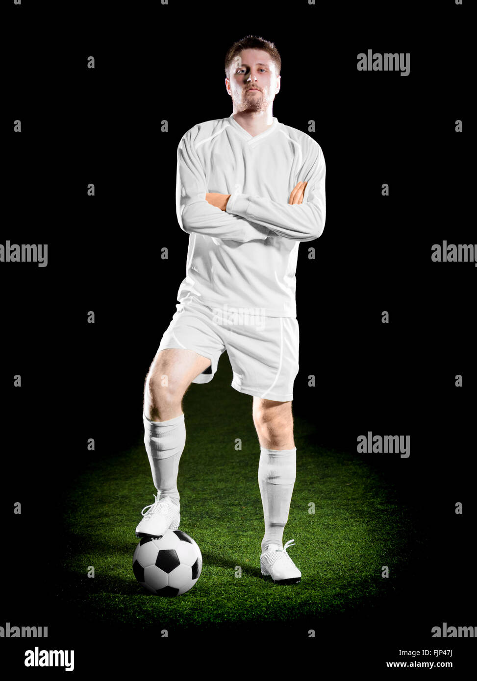 football player in white uniform on grass field Stock Photo - Alamy