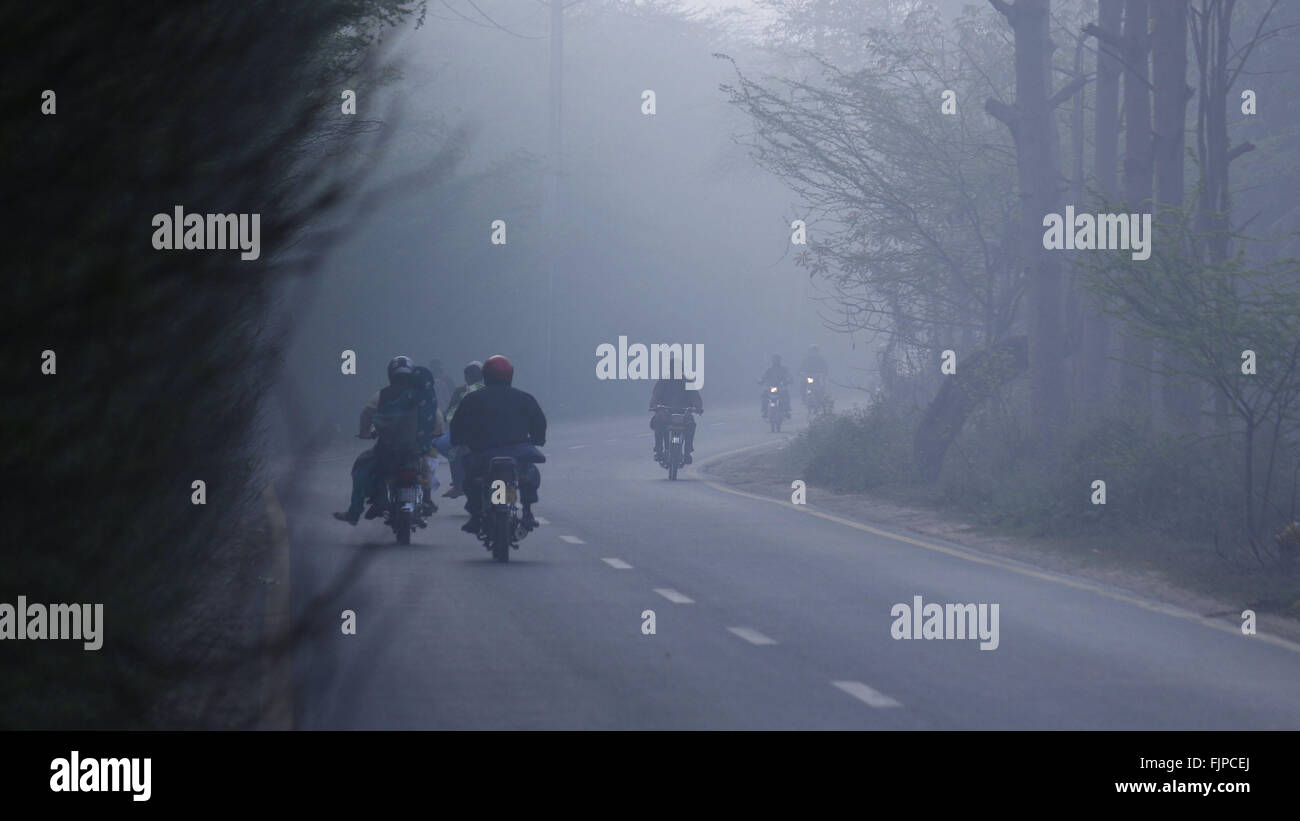 Lahore, Pakistan. 02nd Mar, 2016. Pakistani people passing through ...