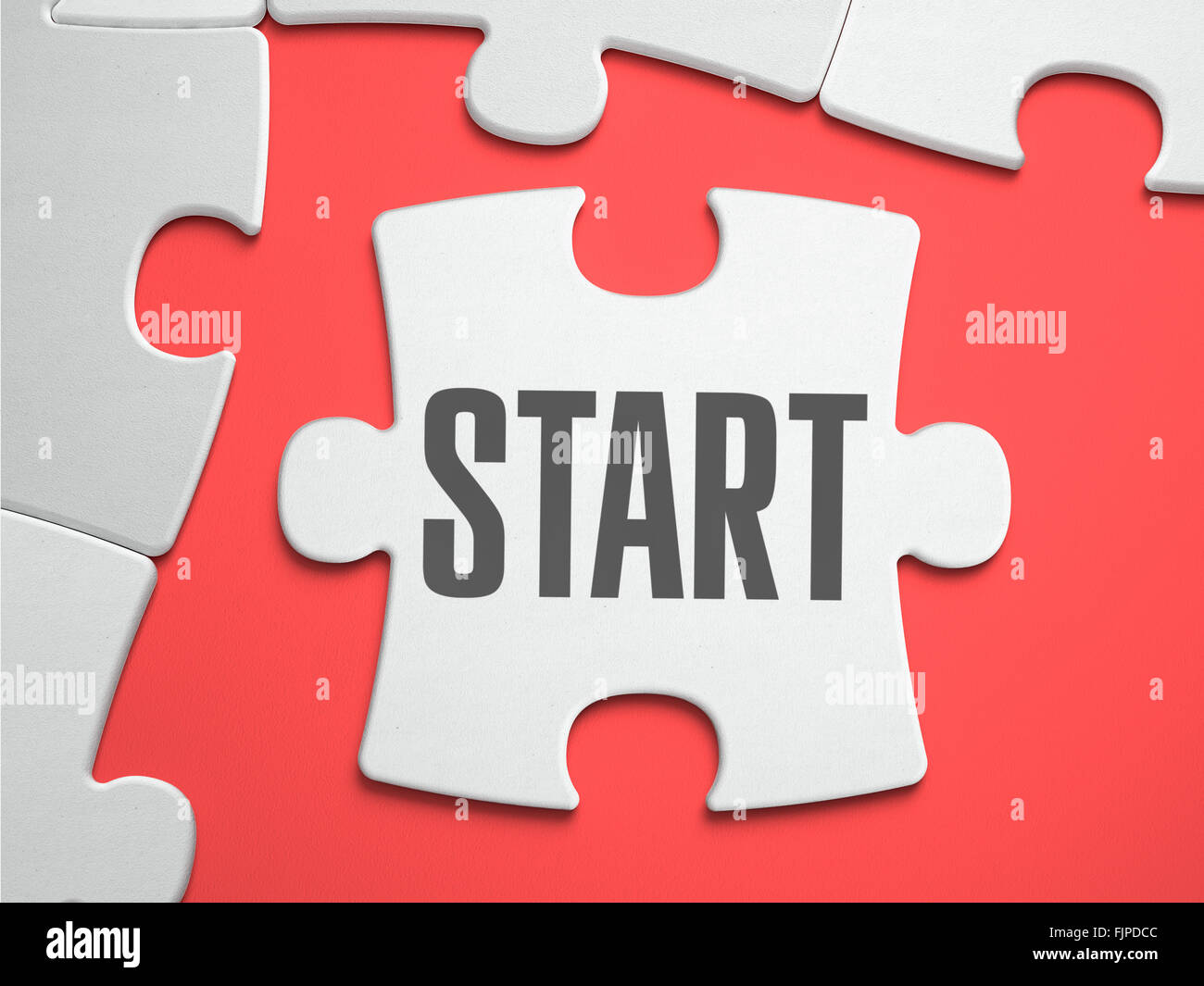 Start - Puzzle on the Place of Missing Pieces Stock Photo - Alamy