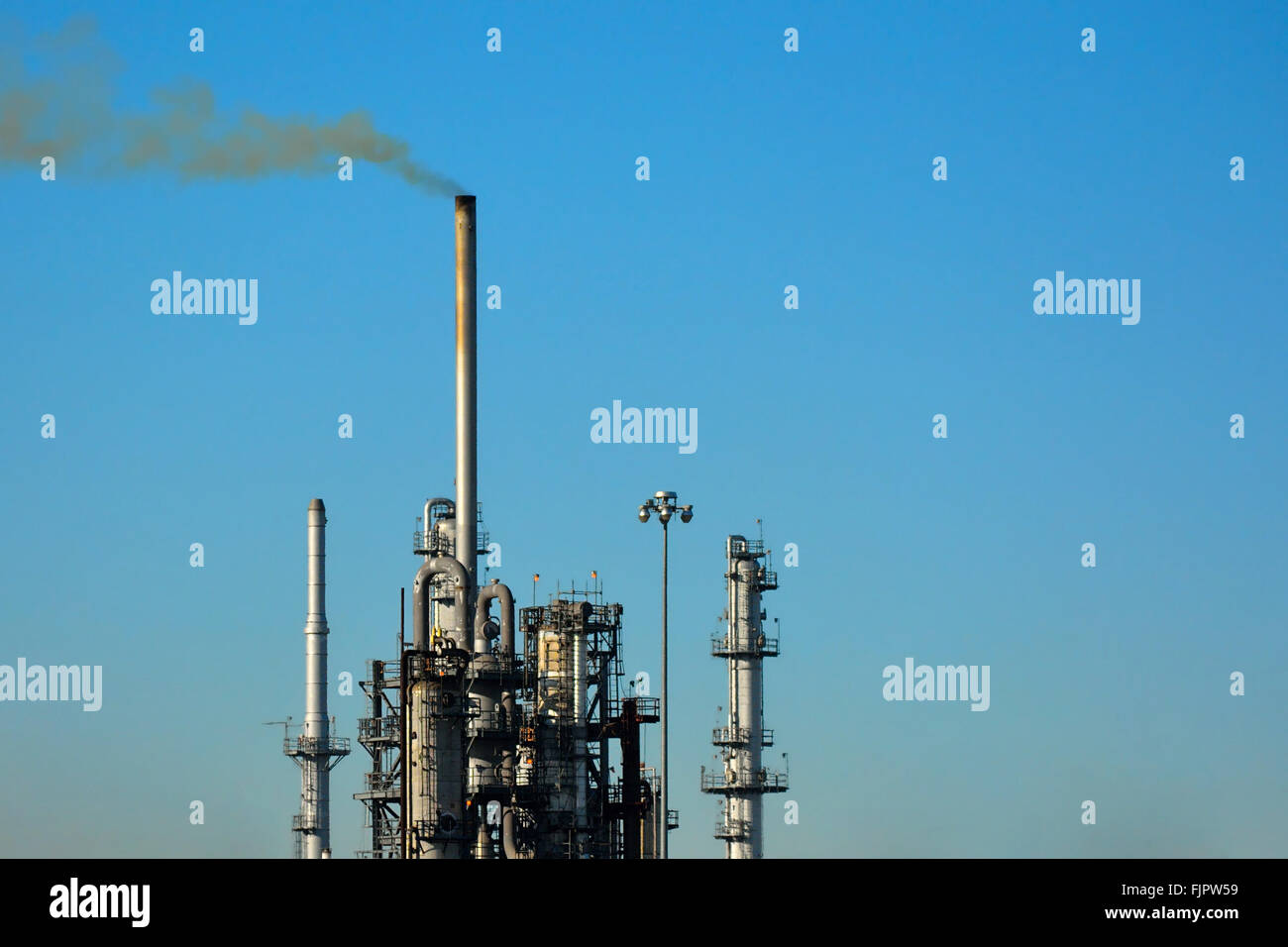 Oil refinery smokestack hi-res stock photography and images - Alamy