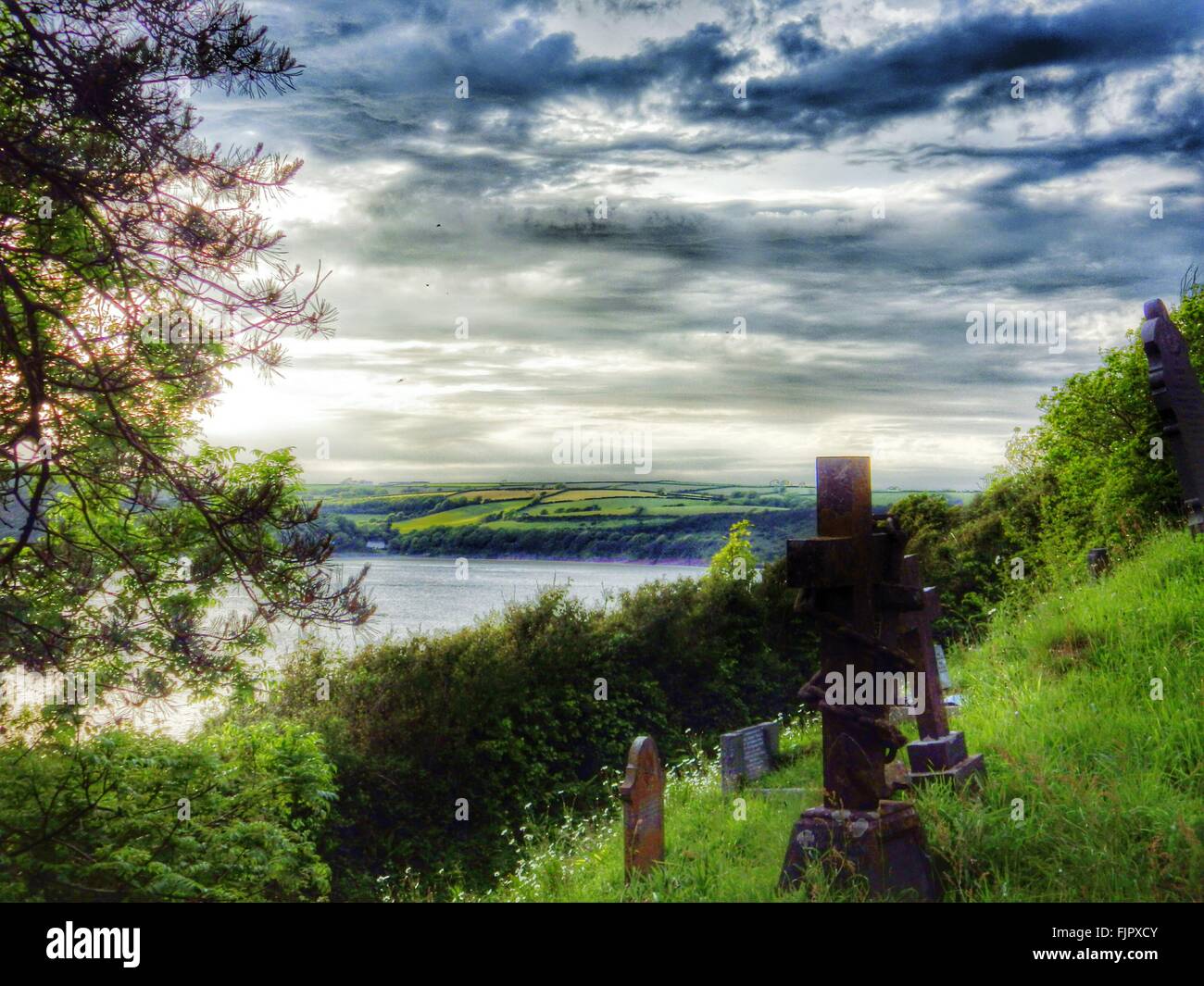 Countryside lake below cloudy sky cloud hi-res stock photography and ...