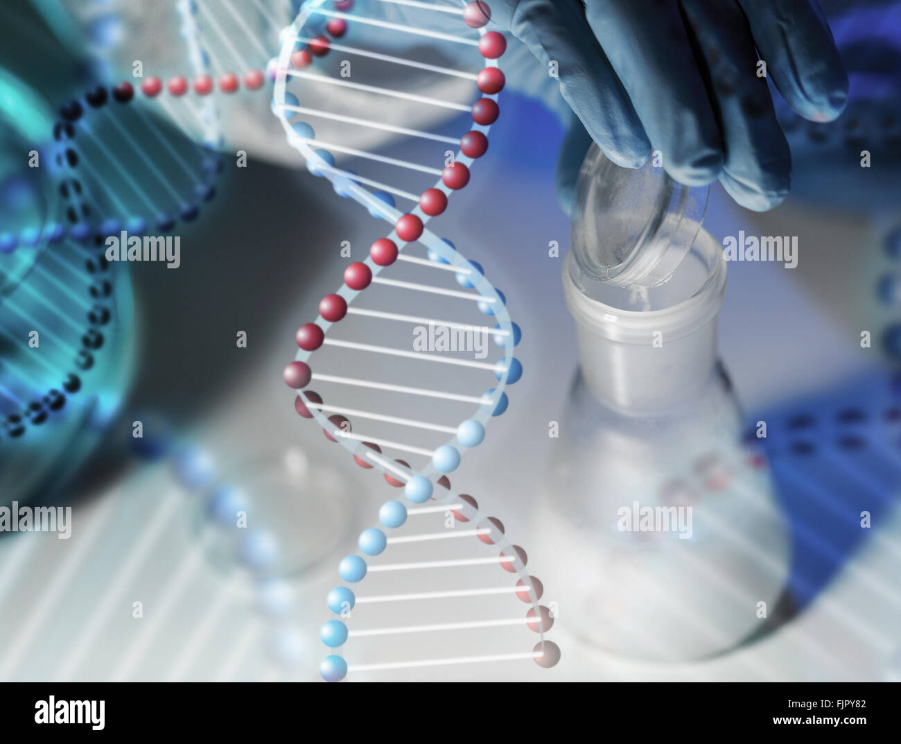 close up of hand pouring chemical into flask Stock Photo - Alamy