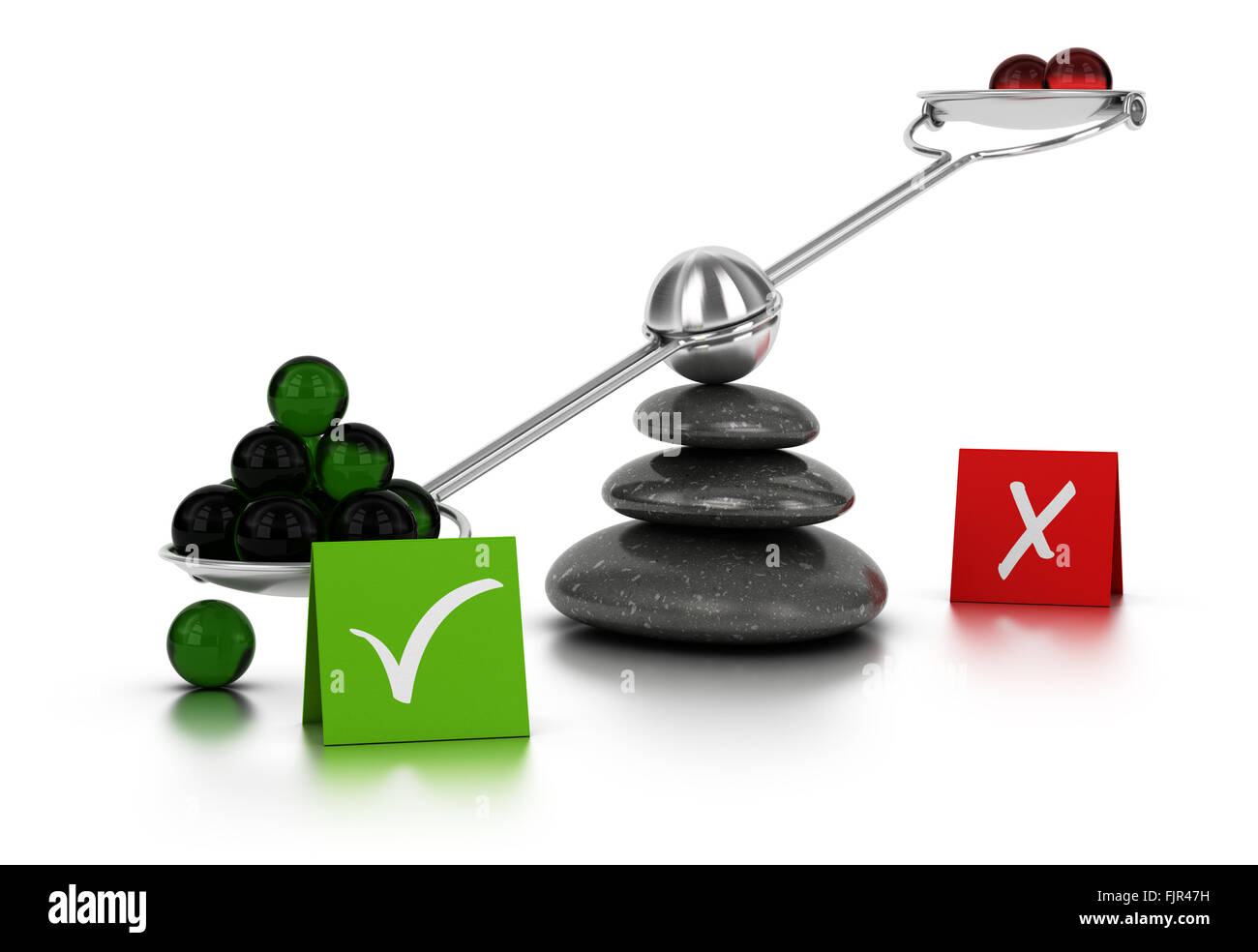Green and red spheres on a seesaw with three black pebbles over white ...