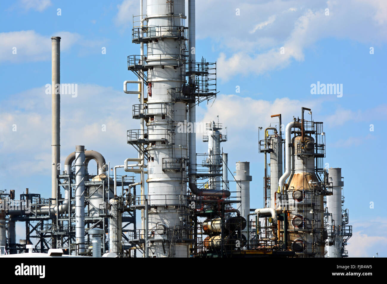 Oil Refinery Distillation Towers on a Sunny Day Stock Photo - Alamy