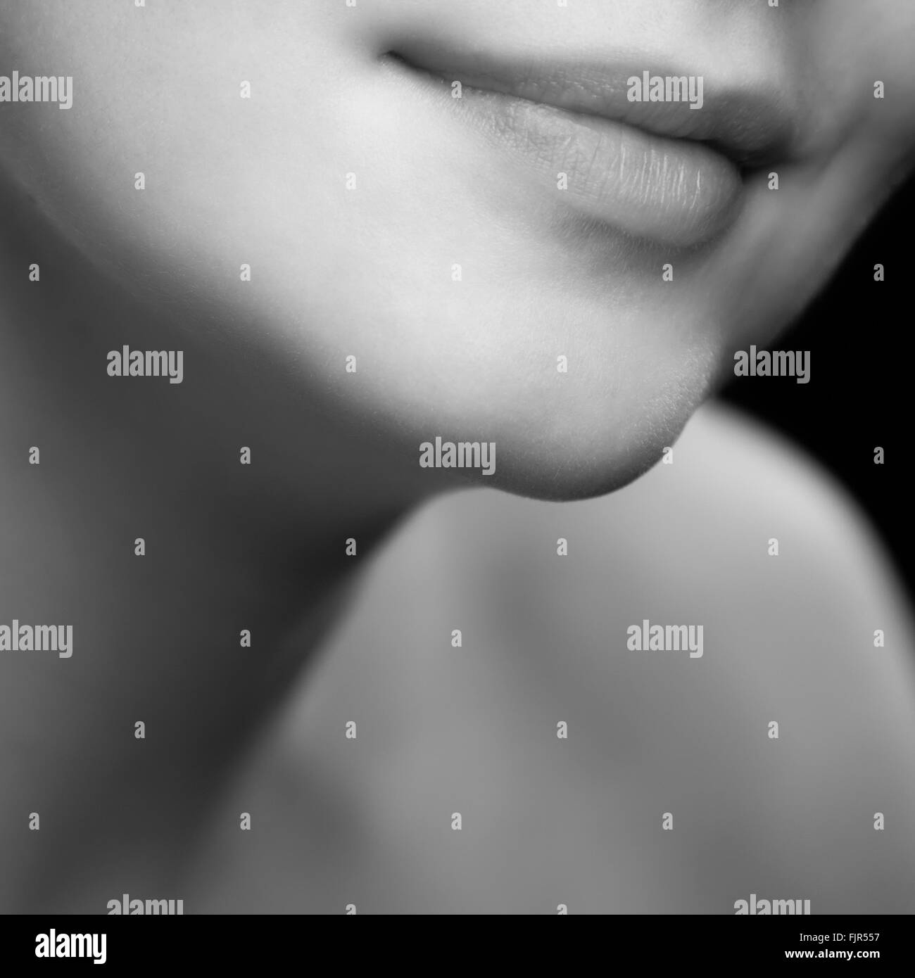 Woman neck shoulder and lips close-up Stock Photo - Alamy
