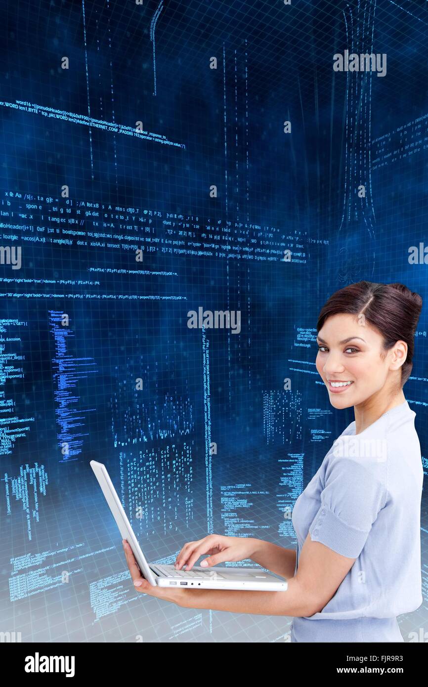 Businesswoman using her laptop Stock Photo - Alamy