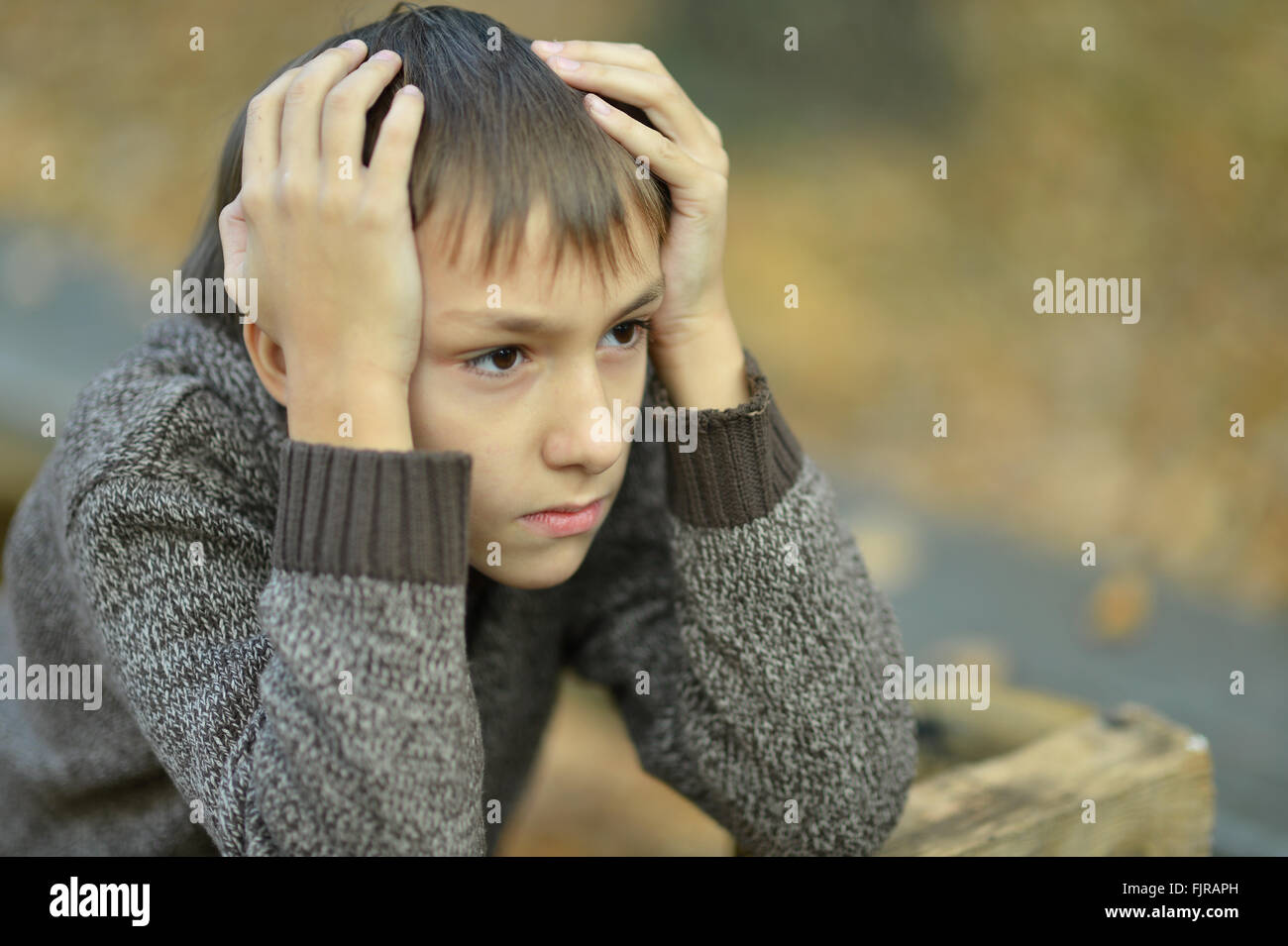 Little sad boy Stock Photo - Alamy