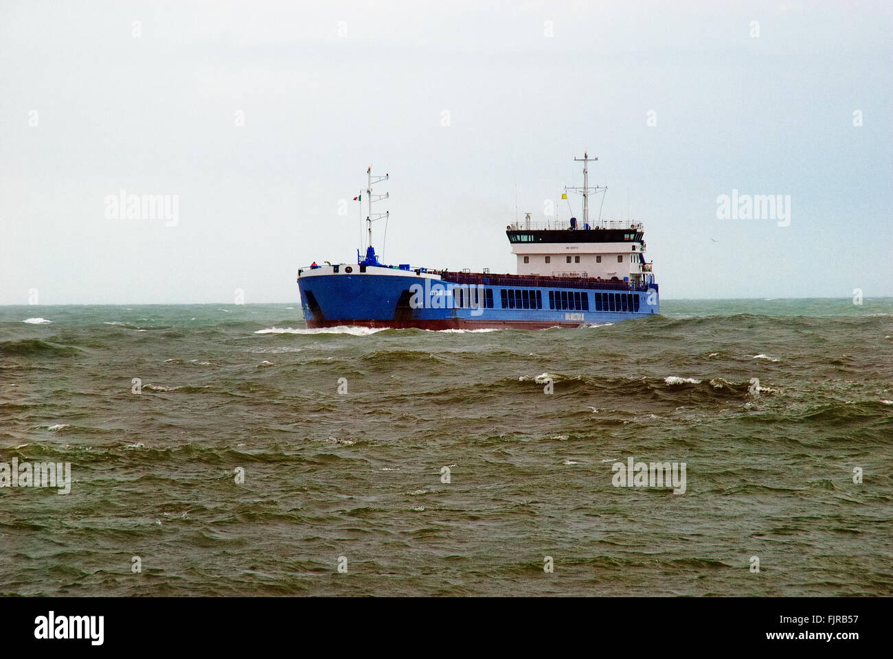 February 29th, 2016. Bad weather in northern Adriatic sea. A cargo ship ...
