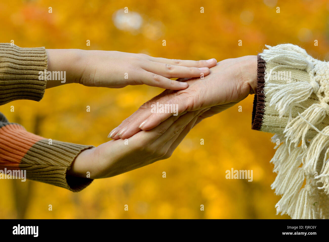 Hands of a loving couple hi-res stock photography and images - Alamy