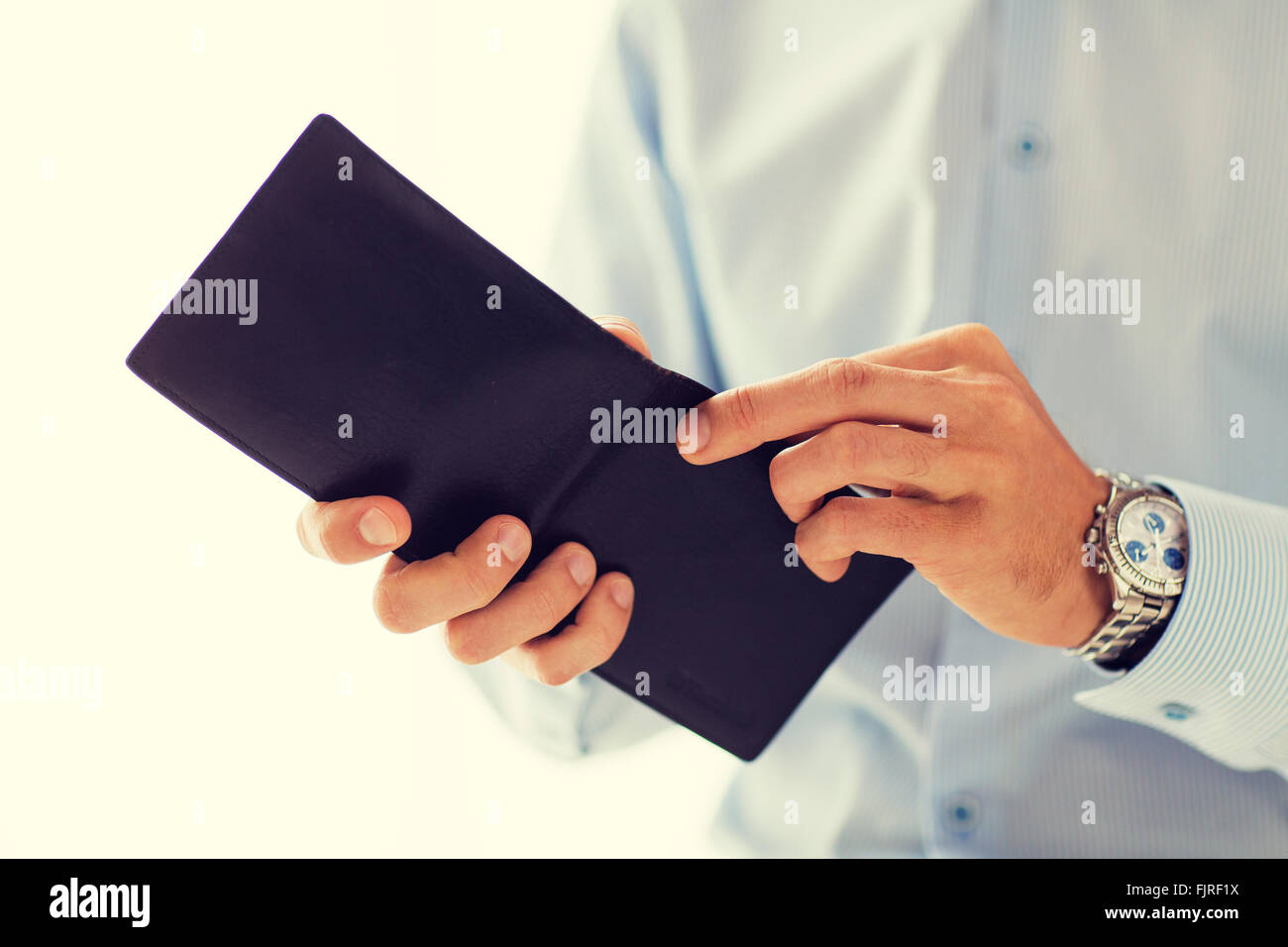close up of businessman hands holding open wallet Stock Photo - Alamy