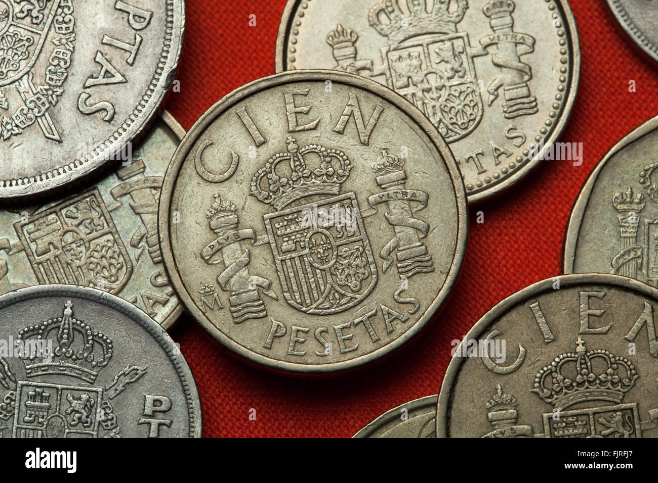 Coins of Spain. Coat of arms of Spain depicted in the Spanish 100 ...