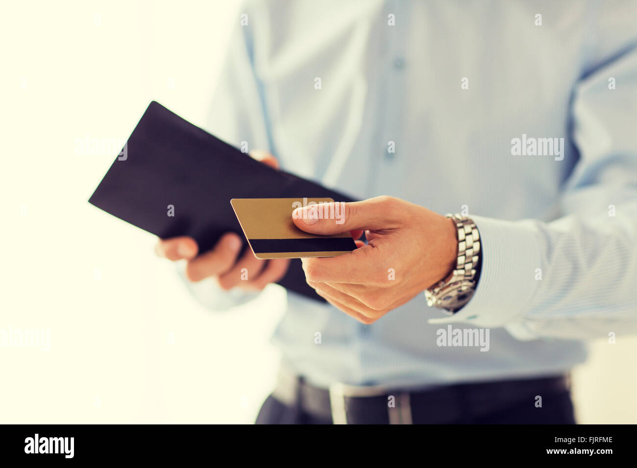 Bank card wallet hands hi-res stock photography and images - Alamy