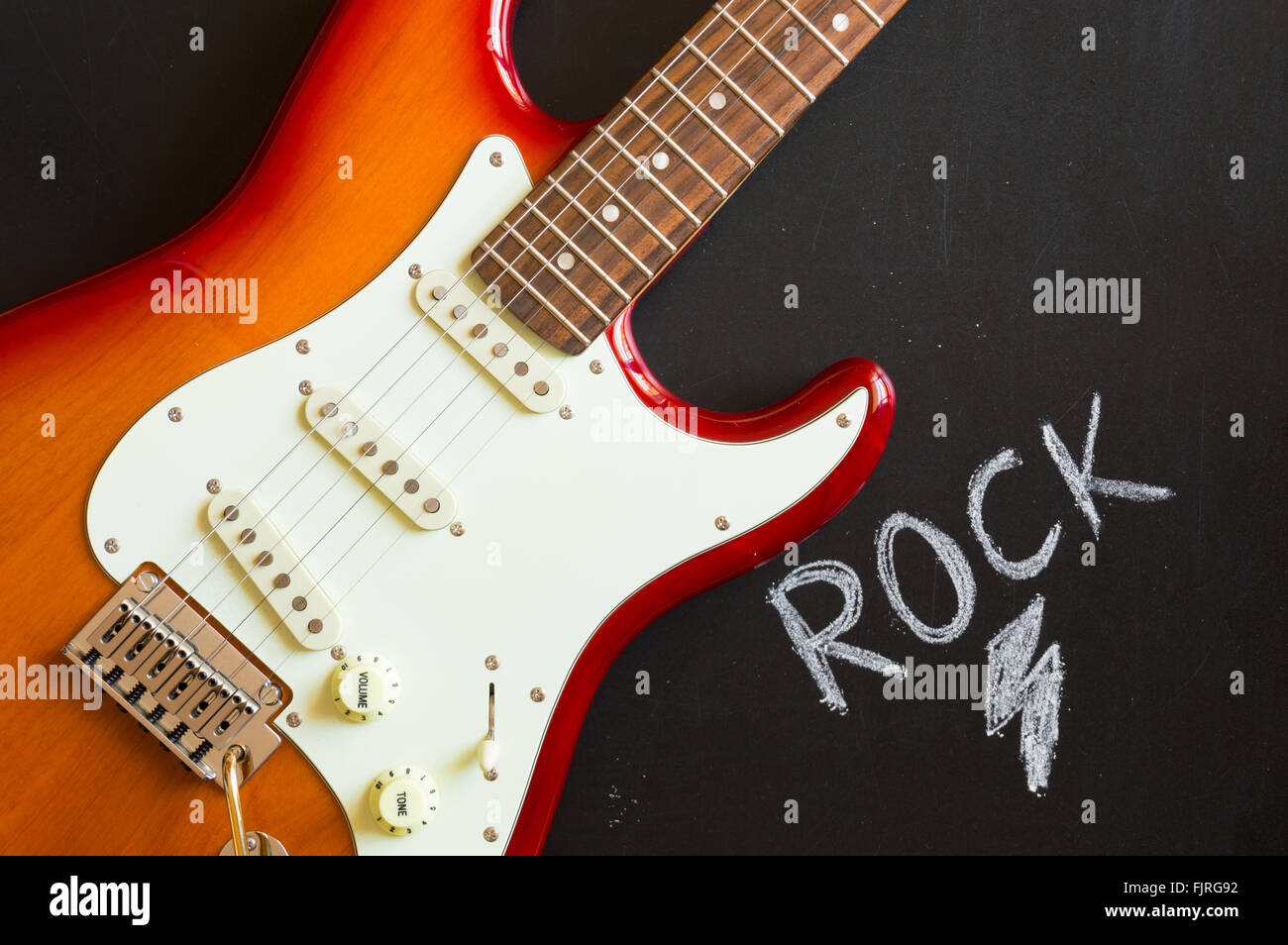 Red electric guitar hi-res stock photography and images - Alamy