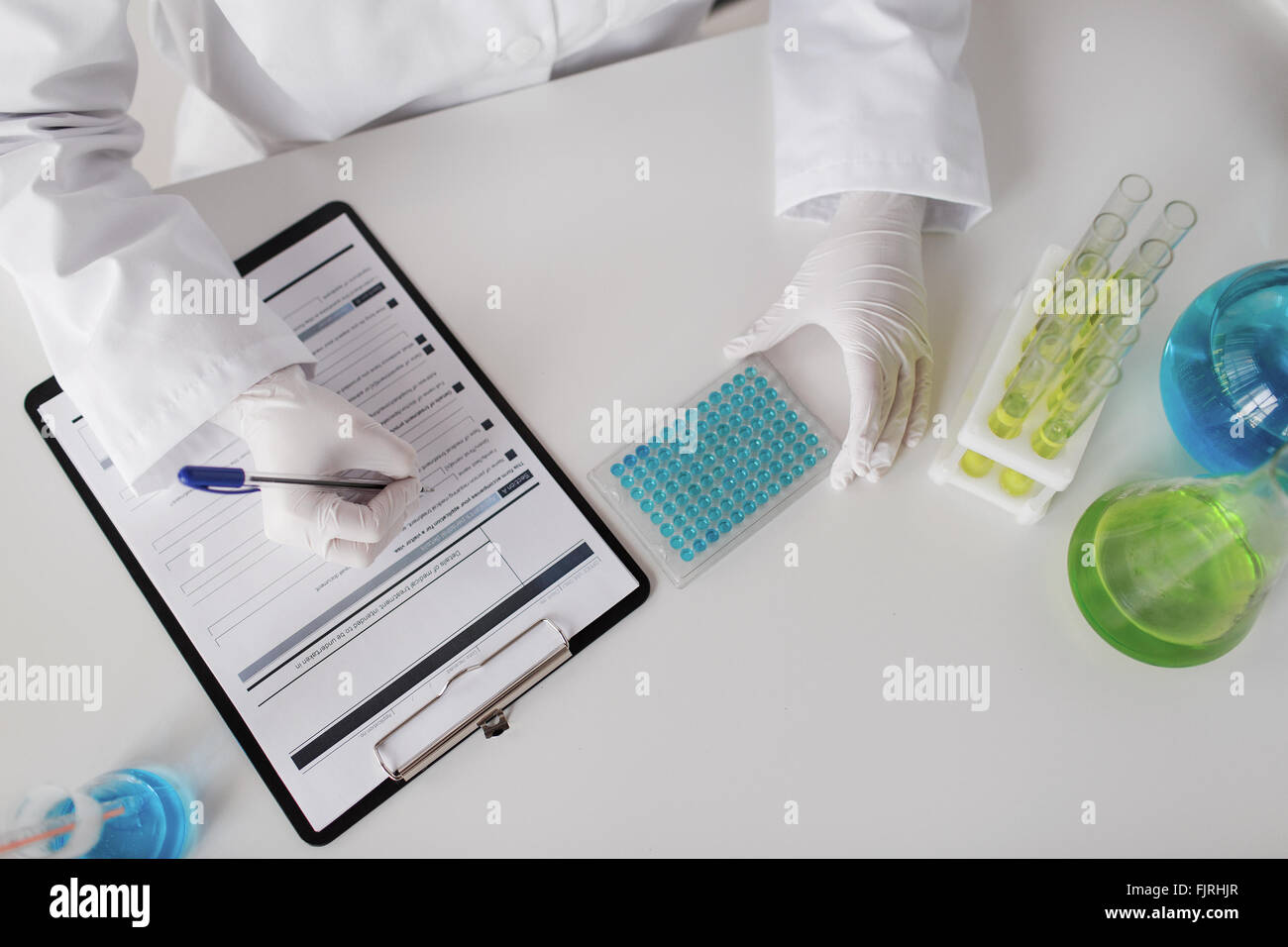 close up of scientist making test in lab Stock Photo - Alamy