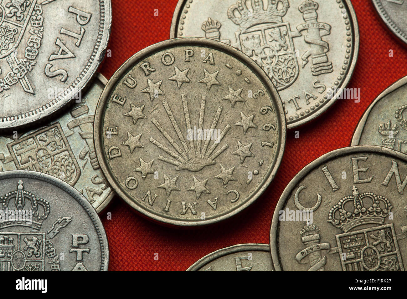 Coins of Spain. Scallop shell symbol for the pilgrimage routes Camino ...