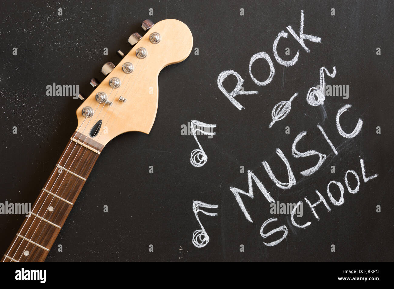Rock music school with electric guitar on blackboard background Stock ...